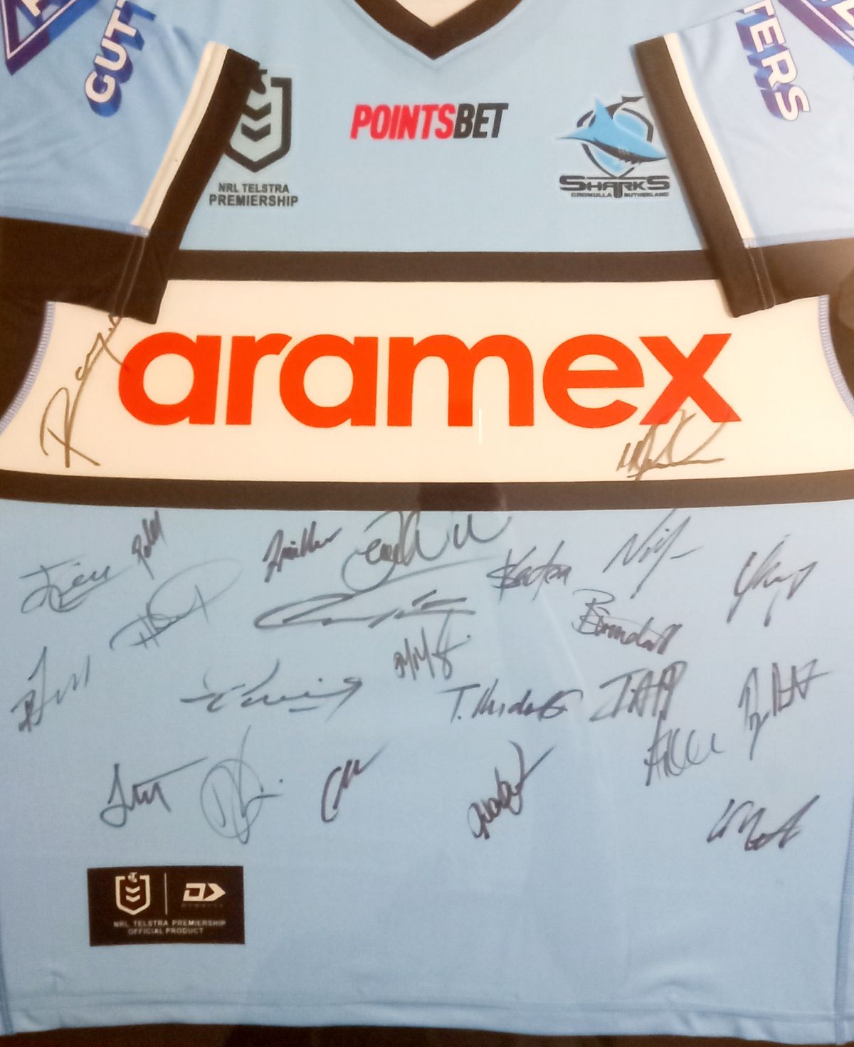 Framed 2022 Signed Cronulla Sharks Players Jersey